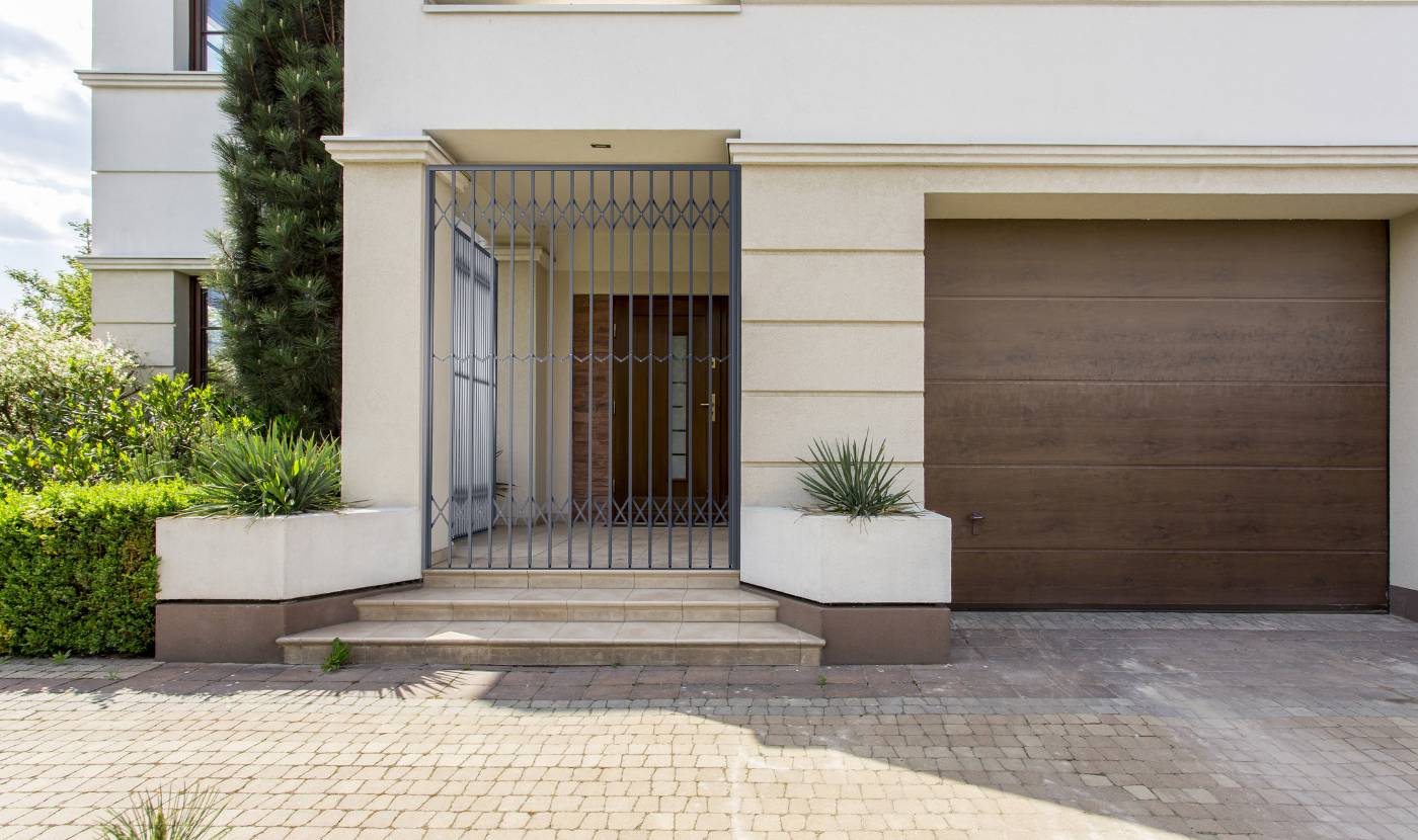 #1 Retractable Security Gates For Sale | DEFENDoor®